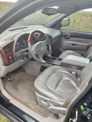 Melns Buick Rendezvous 2009 Kretinga, ar dzinēja tilpumu 3.35 L un nobraukumu 371 tūkst. km par 800 €, foto  vietnē AUTOMOTO.COM.LV