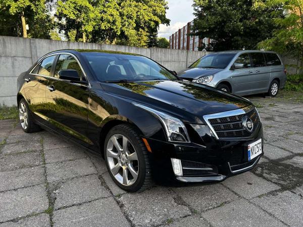 Black Cadillac ATS 2013 in Alytus, with an engine capacity of 2.00 L and mileage of 223 thousand km for 8750 €, photo 1 on AUTOMOTO.COM.LV