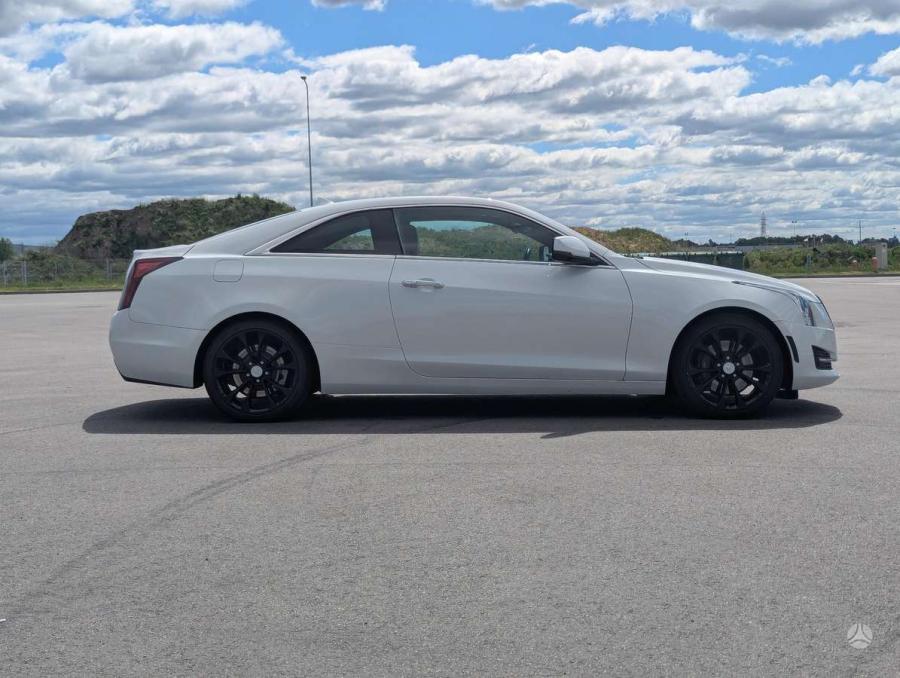 White Cadillac ATS 2016 in Kaunas, with an engine capacity of 2.00 L and mileage of 58 thousand km for 14500 €, photo 4 on AUTOMOTO.COM.LV