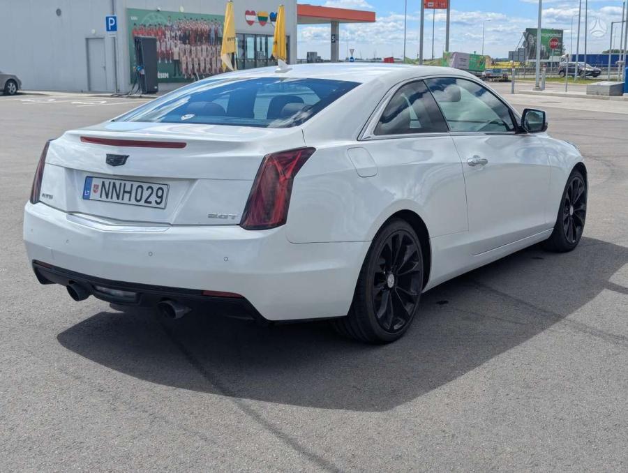 White Cadillac ATS 2016 in Kaunas, with an engine capacity of 2.00 L and mileage of 58 thousand km for 14500 €, photo 5 on AUTOMOTO.COM.LV