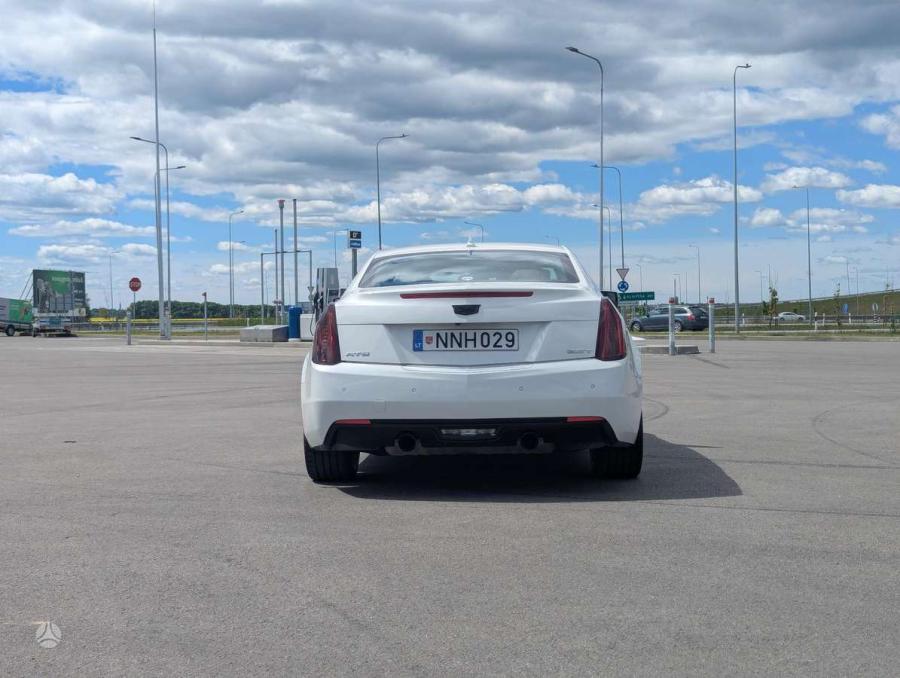 White Cadillac ATS 2016 in Kaunas, with an engine capacity of 2.00 L and mileage of 58 thousand km for 14500 €, photo 6 on AUTOMOTO.COM.LV