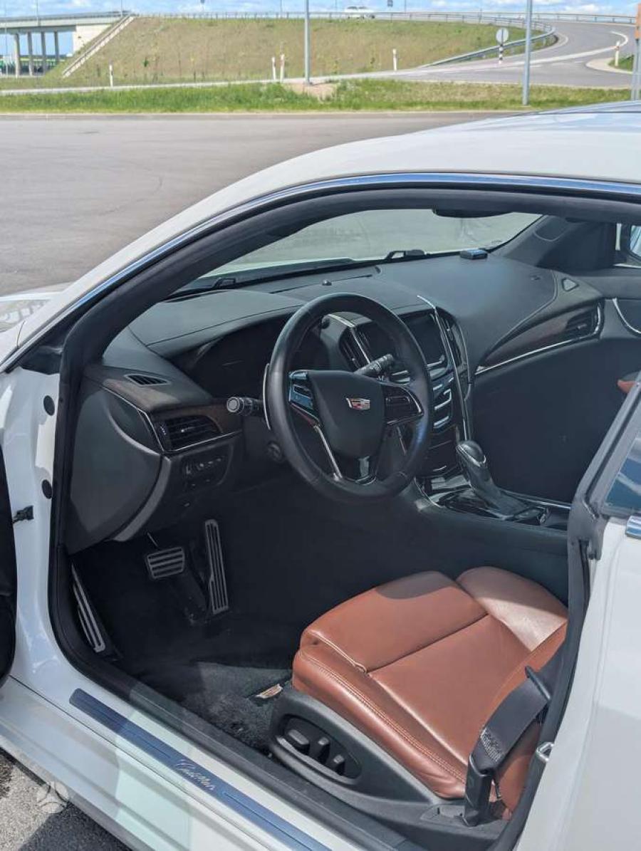 White Cadillac ATS 2016 in Kaunas, with an engine capacity of 2.00 L and mileage of 58 thousand km for 14500 €, photo 8 on AUTOMOTO.COM.LV