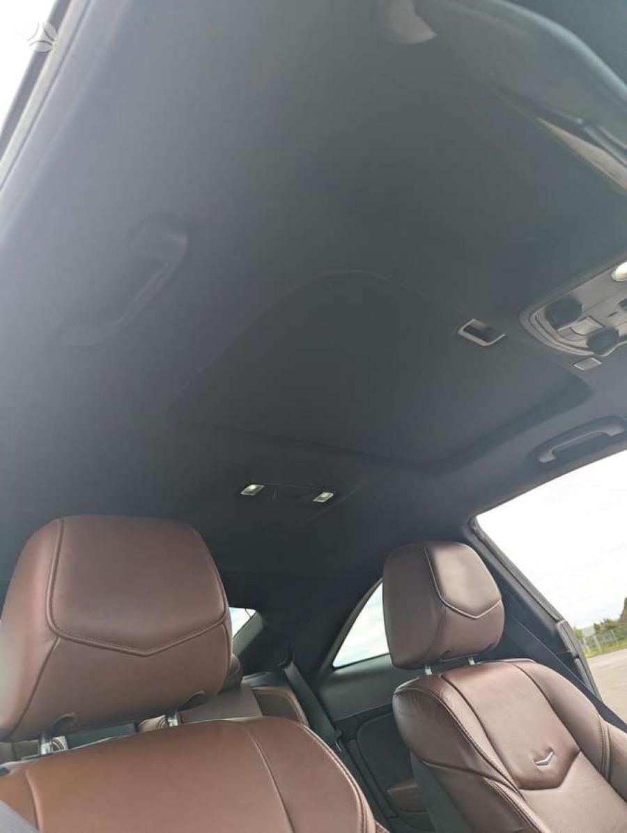 White Cadillac ATS 2016 in Kaunas, with an engine capacity of 2.00 L and mileage of 58 thousand km for 14500 €, photo 14 on AUTOMOTO.COM.LV