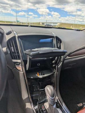 White Cadillac ATS 2016 in Kaunas, with an engine capacity of 2.00 L and mileage of 58 thousand km for 14500 €, photo 21 on AUTOMOTO.COM.LV