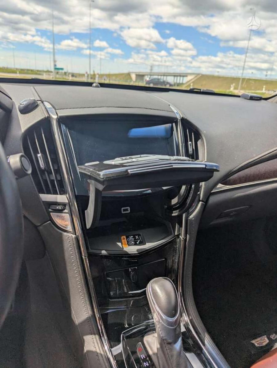 White Cadillac ATS 2016 in Kaunas, with an engine capacity of 2.00 L and mileage of 58 thousand km for 14500 €, photo 21 on AUTOMOTO.COM.LV