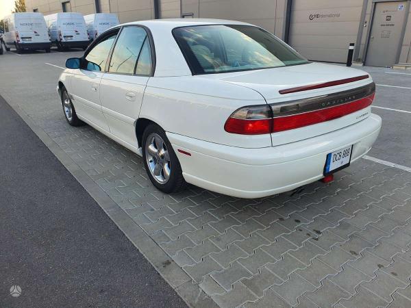 Cadillac Catera 1998 in Vilnius on AUTOMOTO.COM.LV White Cadillac Catera 1998 in Vilnius, with an engine capacity of 2.96 L and mileage of 112 thousand km for 4999 €, photo 1 on AUTOMOTO.COM.LV