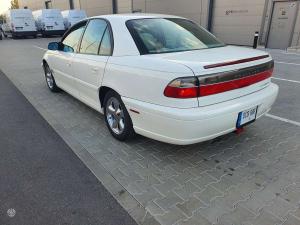 Balts Cadillac Catera 1998 Viļņa, ar dzinēja tilpumu 2.96 L un nobraukumu 112 tūkst. km par 4999 €, foto  vietnē AUTOMOTO.COM.LV