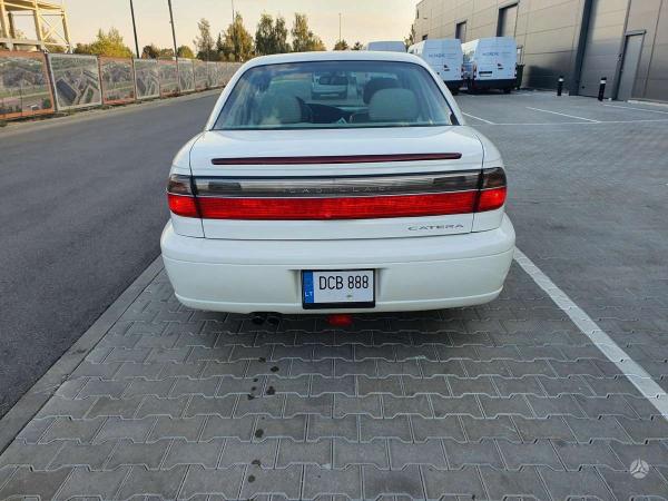 Cadillac Catera 1998 in Vilnius on AUTOMOTO.COM.LV White Cadillac Catera 1998 in Vilnius, with an engine capacity of 2.96 L and mileage of 112 thousand km for 4999 €, photo 3 on AUTOMOTO.COM.LV