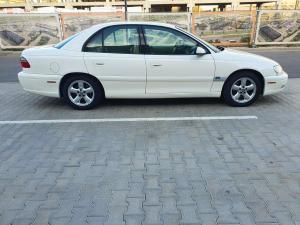 Balts Cadillac Catera 1998 Viļņa, ar dzinēja tilpumu 2.96 L un nobraukumu 112 tūkst. km par 4999 €, foto 5 vietnē AUTOMOTO.COM.LV