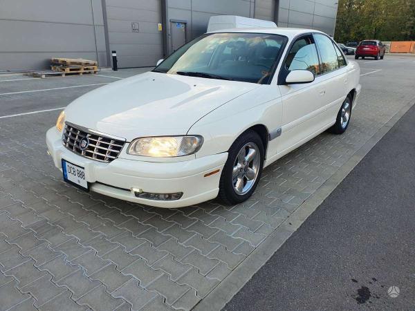 Cadillac Catera 1998 in Vilnius on AUTOMOTO.COM.LV White Cadillac Catera 1998 in Vilnius, with an engine capacity of 2.96 L and mileage of 112 thousand km for 4999 €, photo 8 on AUTOMOTO.COM.LV