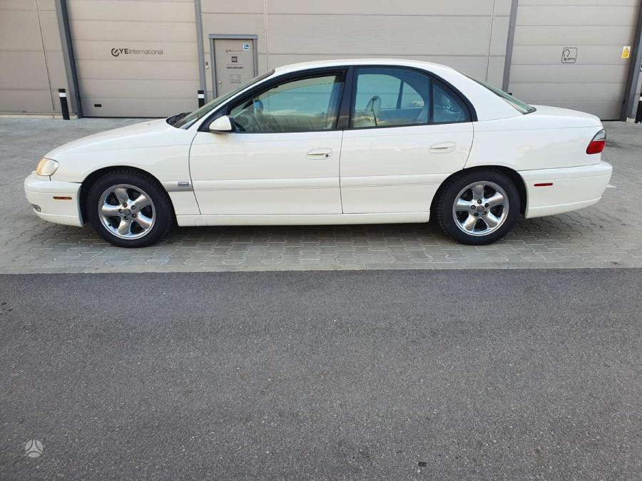 Balts Cadillac Catera 1998 Viļņa, ar dzinēja tilpumu 2.96 L un nobraukumu 112 tūkst. km par 4999 €, foto 9 vietnē AUTOMOTO.COM.LV