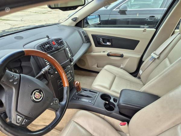 Blue Cadillac CTS 2004 in Utena, with an engine capacity of 3.18 L and mileage of 194 thousand km for 1990 €, photo 7 on AUTOMOTO.COM.LV