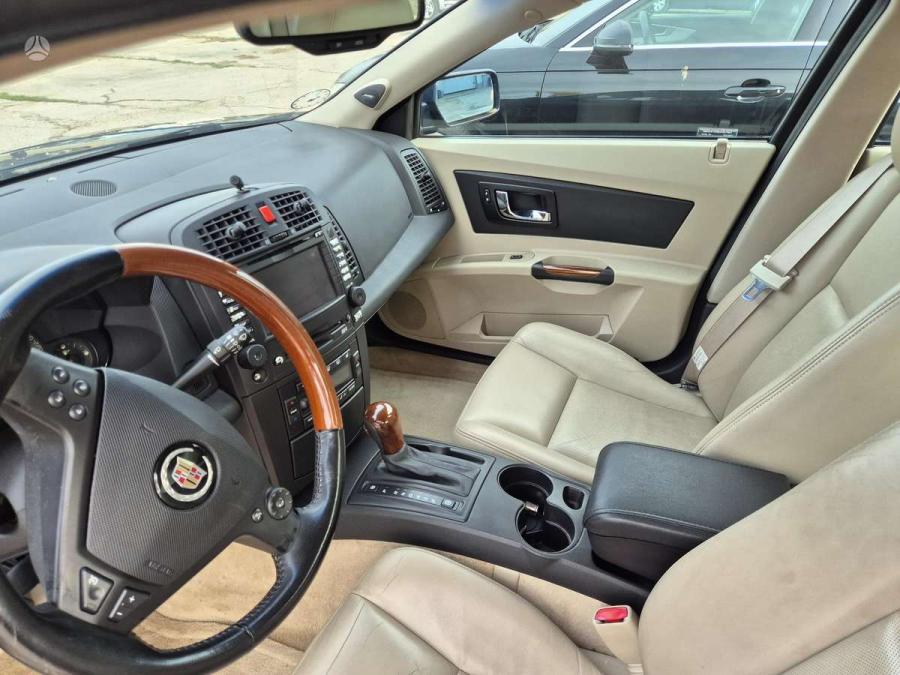 Blue Cadillac CTS 2004 in Utena, with an engine capacity of 3.18 L and mileage of 194 thousand km for 1990 €, photo 7 on AUTOMOTO.COM.LV