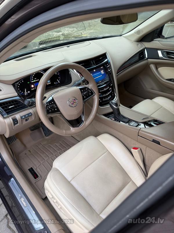 Violet Cadillac CTS 2015 in Tallinn, with an engine capacity of 2.00 L and mileage of 75 thousand km for 14500 €, photo 10 on AUTOMOTO.COM.LV