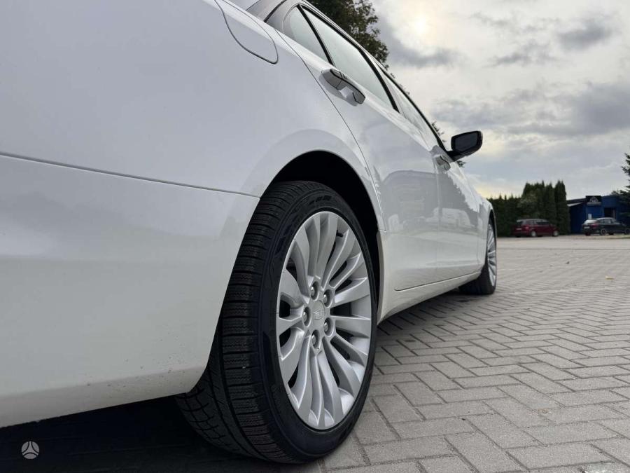 White Cadillac CTS 2016 in Kretinga, with an engine capacity of 2.00 L and mileage of 112 thousand km for 14995 €, photo 12 on AUTOMOTO.COM.LV