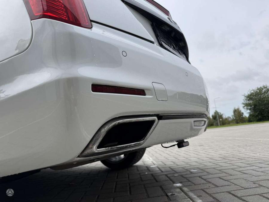 White Cadillac CTS 2016 in Kretinga, with an engine capacity of 2.00 L and mileage of 112 thousand km for 14995 €, photo 14 on AUTOMOTO.COM.LV