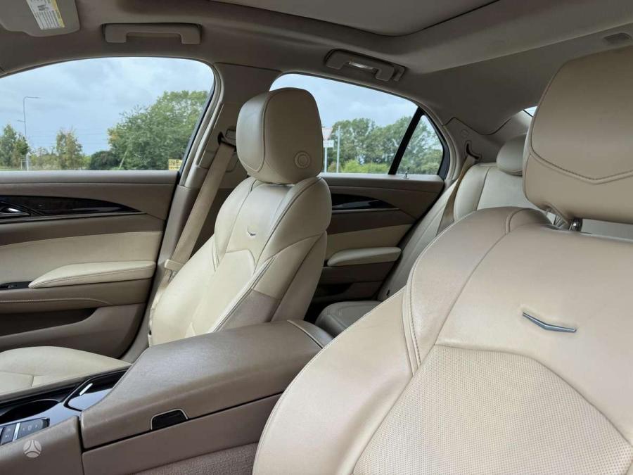 White Cadillac CTS 2016 in Kretinga, with an engine capacity of 2.00 L and mileage of 112 thousand km for 14995 €, photo 18 on AUTOMOTO.COM.LV