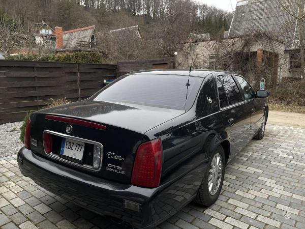 Black Cadillac de-ville 2004 in Kaunas, with an engine capacity of 4.57 L and mileage of 188 thousand km for 4000 €, photo 2 on AUTOMOTO.COM.LV