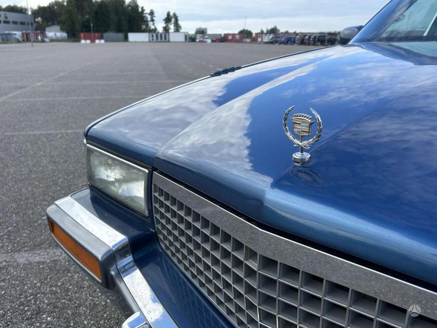 Zils Cadillac de-ville 1990 Viļņa, ar dzinēja tilpumu 4.47 L un nobraukumu 207 tūkst. km par 11111 €, foto 21 vietnē AUTOMOTO.COM.LV