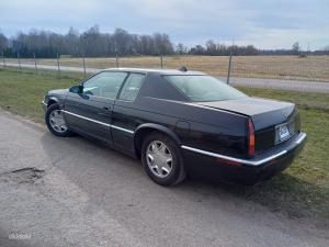 Melns Cadillac Eldorado 1996 Tallina, ar dzinēja tilpumu 4.60 L un nobraukumu 197 tūkst. km par 5550 €, foto 19 vietnē AUTOMOTO.COM.LV