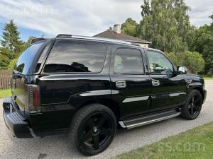 Melns Cadillac Escalade 2002 Rīga, ar dzinēja tilpumu 6.00 L un nobraukumu 71 tūkst. km par 12800 €, foto 5 vietnē AUTOMOTO.COM.LV