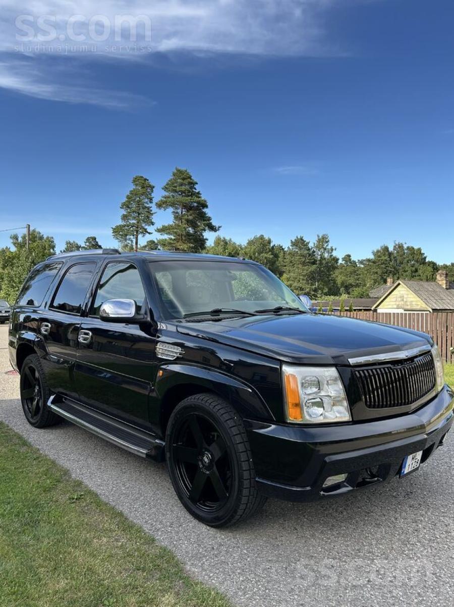 Melns Cadillac Escalade 2002 Rīga, ar dzinēja tilpumu 6.00 L un nobraukumu 71 tūkst. km par 12800 €, foto 6 vietnē AUTOMOTO.COM.LV
