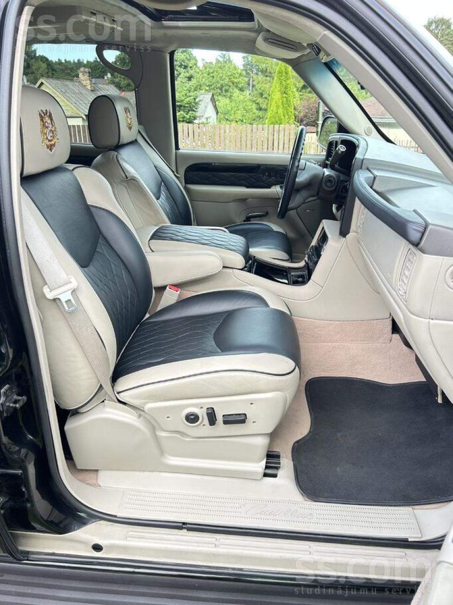 Melns Cadillac Escalade 2002 Rīga, ar dzinēja tilpumu 6.00 L un nobraukumu 71 tūkst. km par 12800 €, foto 11 vietnē AUTOMOTO.COM.LV