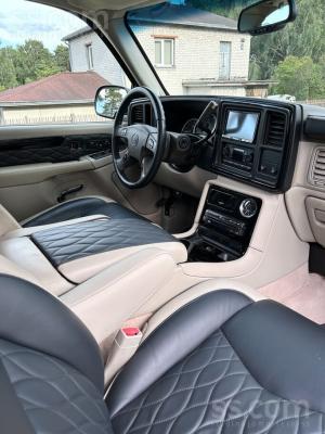 Melns Cadillac Escalade 2002 Rīga, ar dzinēja tilpumu 6.00 L un nobraukumu 71 tūkst. km par 12800 €, foto 13 vietnē AUTOMOTO.COM.LV