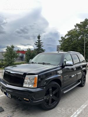 Melns Cadillac Escalade 2002 Rīga, ar dzinēja tilpumu 6.00 L un nobraukumu 71 tūkst. km par 12800 €, foto 22 vietnē AUTOMOTO.COM.LV