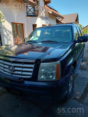 Melns Cadillac Escalade 2005 Rīga, ar dzinēja tilpumu 6.00 L un nobraukumu 319 tūkst. km par 5500 €, foto  vietnē AUTOMOTO.COM.LV