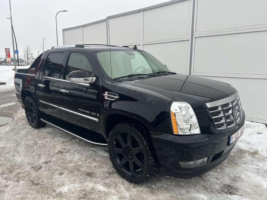 Melns Cadillac Escalade 2007 Alīta, ar dzinēja tilpumu 6.20 L un nobraukumu 190 tūkst. km par 14999 €, foto 1 vietnē AUTOMOTO.COM.LV