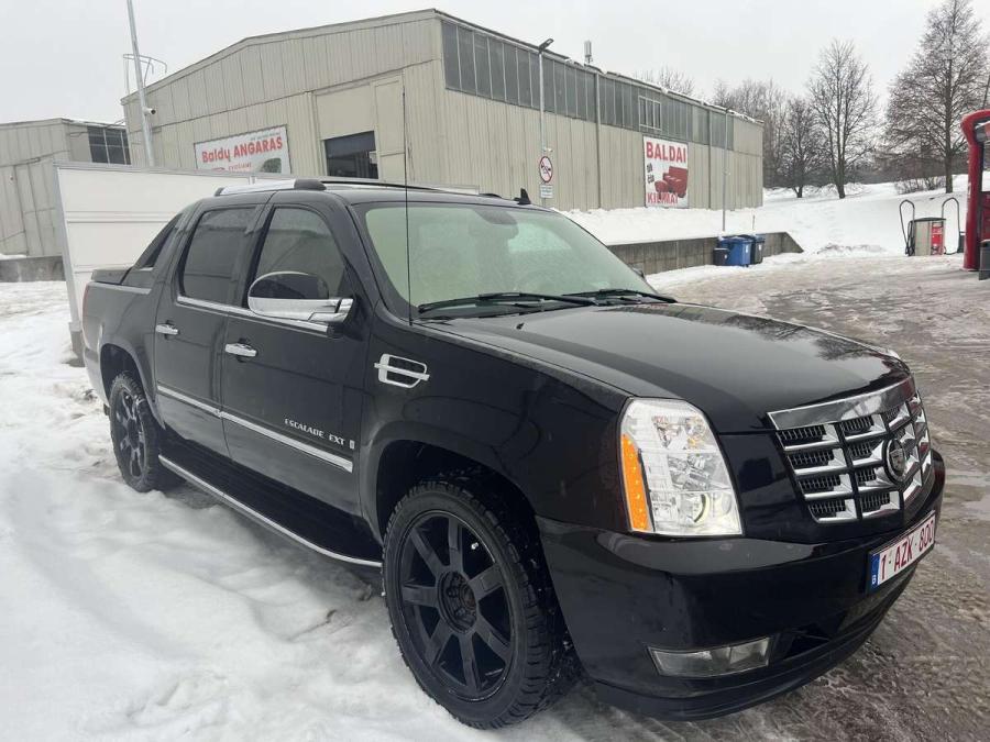 Melns Cadillac Escalade 2007 Alīta, ar dzinēja tilpumu 6.20 L un nobraukumu 190 tūkst. km par 14999 €, foto 3 vietnē AUTOMOTO.COM.LV