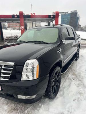 Melns Cadillac Escalade 2007 Alīta, ar dzinēja tilpumu 6.20 L un nobraukumu 190 tūkst. km par 14999 €, foto 14 vietnē AUTOMOTO.COM.LV