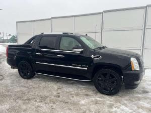 Melns Cadillac Escalade 2007 Alīta, ar dzinēja tilpumu 6.20 L un nobraukumu 190 tūkst. km par 14999 €, foto 16 vietnē AUTOMOTO.COM.LV