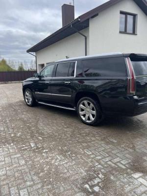 Black Cadillac Escalade 2015 in Vilnius, with an engine capacity of 6.16 L and mileage of 266 thousand km for 20999 €, photo 3 on AUTOMOTO.COM.LV