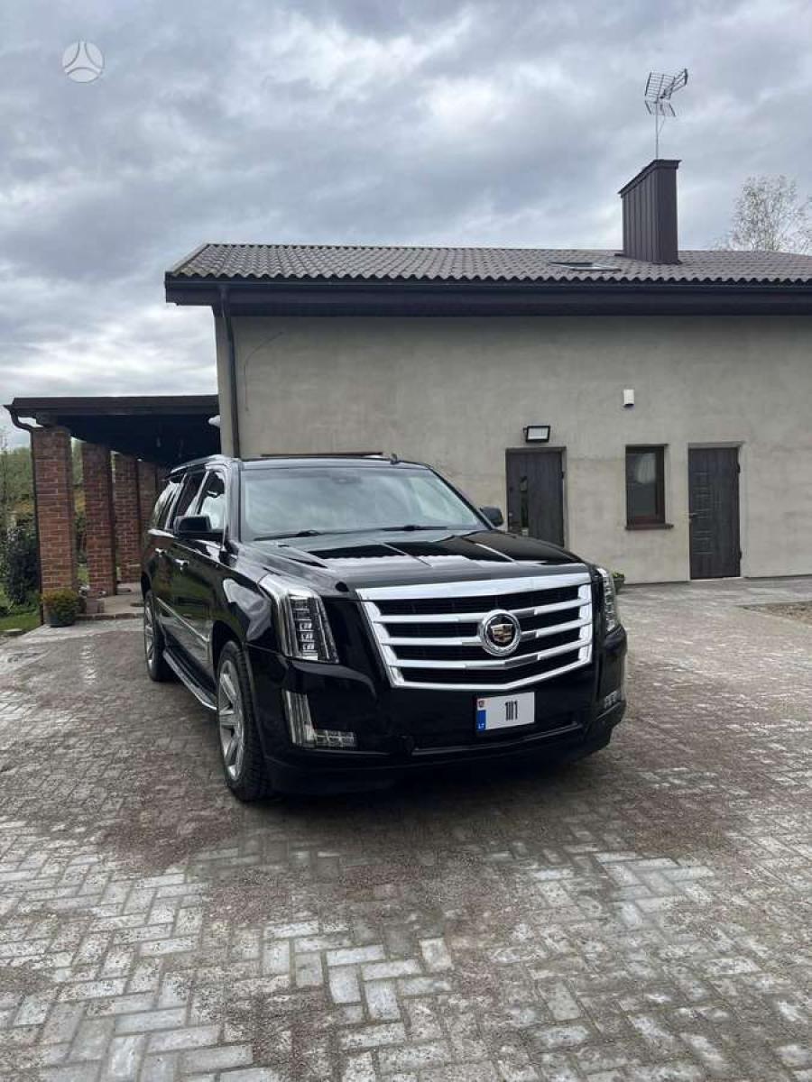 Black Cadillac Escalade 2015 in Vilnius, with an engine capacity of 6.16 L and mileage of 266 thousand km for 20999 €, photo 9 on AUTOMOTO.COM.LV