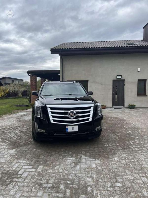 Melns Cadillac Escalade 2015 Viļņa, ar dzinēja tilpumu 6.16 L un nobraukumu 266 tūkst. km par 20999 €, foto 10 vietnē AUTOMOTO.COM.LV
