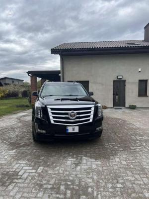 Black Cadillac Escalade 2015 in Vilnius, with an engine capacity of 6.16 L and mileage of 266 thousand km for 20999 €, photo 11 on AUTOMOTO.COM.LV