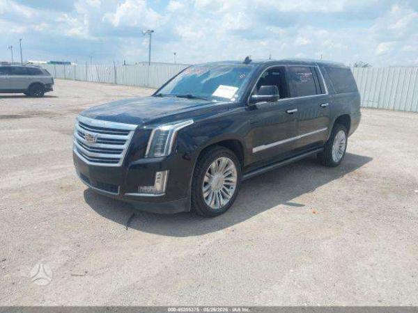 Black Cadillac Escalade 2018 in Vilnius, with an engine capacity of 6.16 L and mileage of 313 thousand km for 13999 €, photo 1 on AUTOMOTO.COM.LV