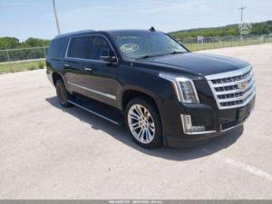 Black Cadillac Escalade 2019 in Vilnius, with an engine capacity of 6.16 L and mileage of 233 thousand km for 14999 €, photo  on AUTOMOTO.COM.LV