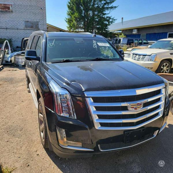 Black Cadillac Escalade 2015 in Tallinn, with an engine capacity of 6.20 L and mileage of 140 thousand km for 17000 €, photo 1 on AUTOMOTO.COM.LV