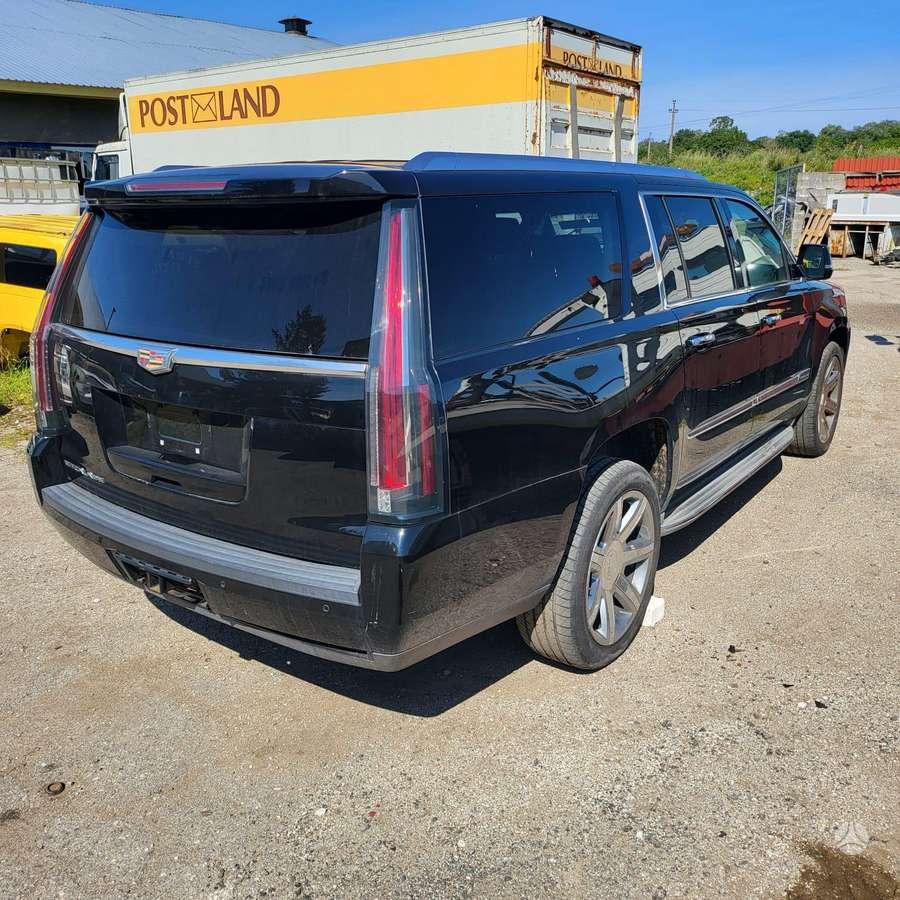 Black Cadillac Escalade 2015 in Tallinn, with an engine capacity of 6.20 L and mileage of 140 thousand km for 17000 €, photo 5 on AUTOMOTO.COM.LV