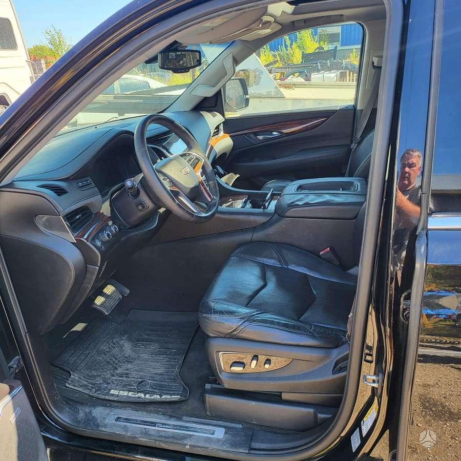 Black Cadillac Escalade 2015 in Tallinn, with an engine capacity of 6.20 L and mileage of 140 thousand km for 17000 €, photo 6 on AUTOMOTO.COM.LV