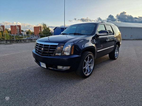 Zils Cadillac Escalade 2009 Viļņa, ar dzinēja tilpumu 6.16 L un nobraukumu 227 tūkst. km par 9750 €, foto 1 vietnē AUTOMOTO.COM.LV