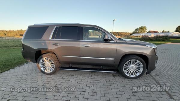 Brown Cadillac Escalade 2015 in Tallinn, with an engine capacity of 6.20 L and mileage of 243 thousand km for 24900 €, photo 9 on AUTOMOTO.COM.LV