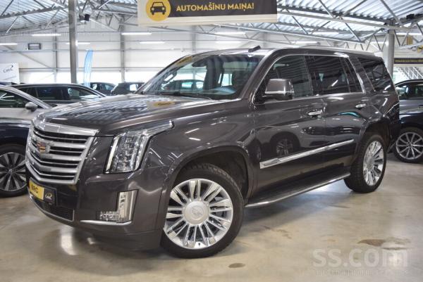Grey Cadillac Escalade 2016 in Riga, with an engine capacity of 6.20 L and mileage of 59 thousand km for 39000 €, photo 1 on AUTOMOTO.COM.LV