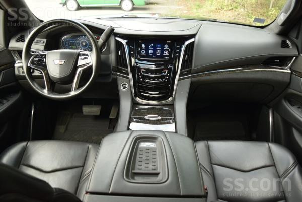 Grey Cadillac Escalade 2016 in Riga, with an engine capacity of 6.20 L and mileage of 59 thousand km for 39000 €, photo 4 on AUTOMOTO.COM.LV