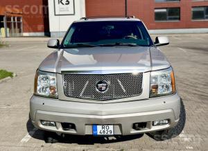 Pelēks Cadillac Escalade 2004 Rīga, ar dzinēja tilpumu 6.00 L un nobraukumu 350 tūkst. km par 9500 €, foto 3 vietnē AUTOMOTO.COM.LV