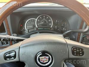 Pelēks Cadillac Escalade 2004 Rīga, ar dzinēja tilpumu 6.00 L un nobraukumu 350 tūkst. km par 9500 €, foto 5 vietnē AUTOMOTO.COM.LV