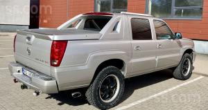 Pelēks Cadillac Escalade 2004 Rīga, ar dzinēja tilpumu 6.00 L un nobraukumu 350 tūkst. km par 9500 €, foto 13 vietnē AUTOMOTO.COM.LV